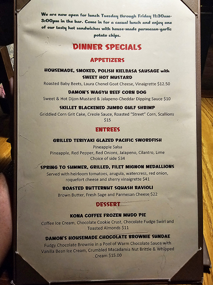 The menu reads like a love letter to carnivores with a tropical twist. That Kona Coffee Frozen Mudd Pie might be worth saving room for.