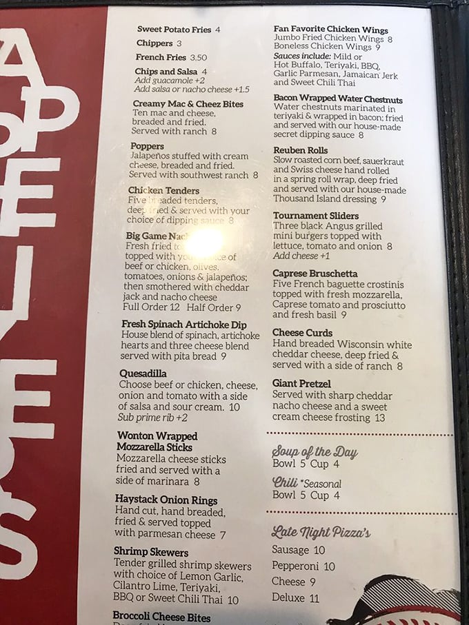 A menu that reads like a love letter to bar food done right. Notice how the appetizers section is twice as long as most restaurants' entire menus?