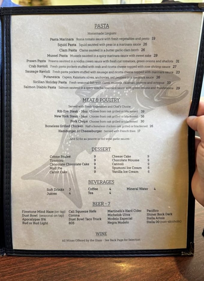 A menu that reads like poetry to seafood enthusiasts. The Sicilian Holiday Pasta alone could inspire sonnets from satisfied diners.