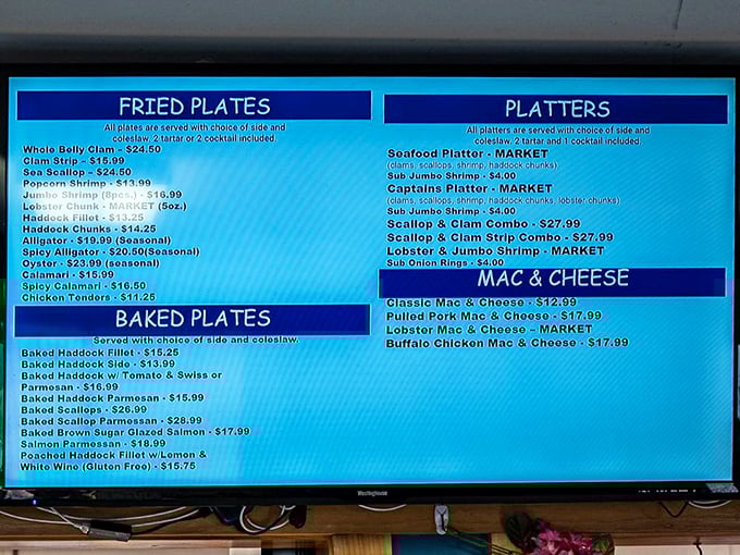 Behind the pine-paneled counter, Kay's staff works their magic while the illuminated menu board promises oceanic treasures that would make Neptune himself place a to-go order.