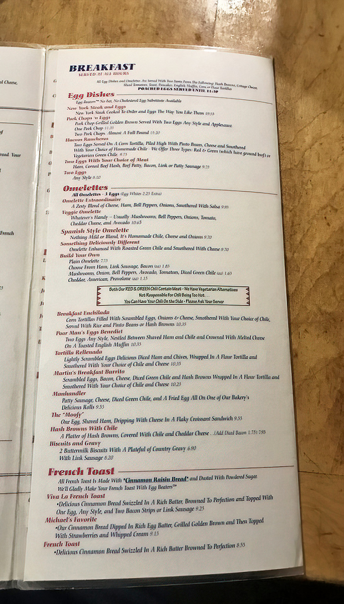 The breakfast menu reads like a love letter to morning hunger, with each description promising a delicious start to your Taos adventure.
