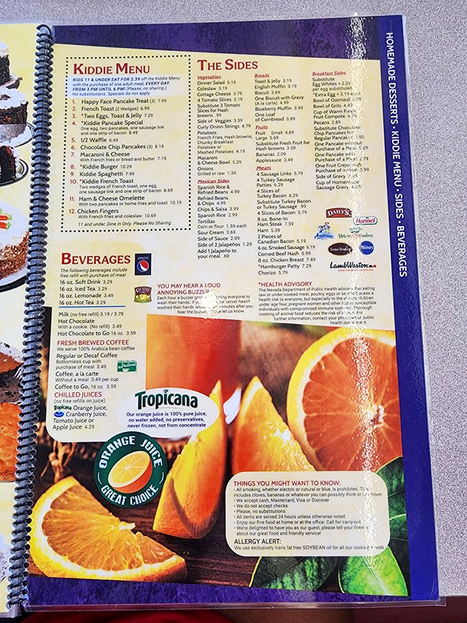 The spiral-bound menu&mdash;a sacred text of breakfast possibilities that makes choosing just one item feel like Sophie's Choice with syrup.