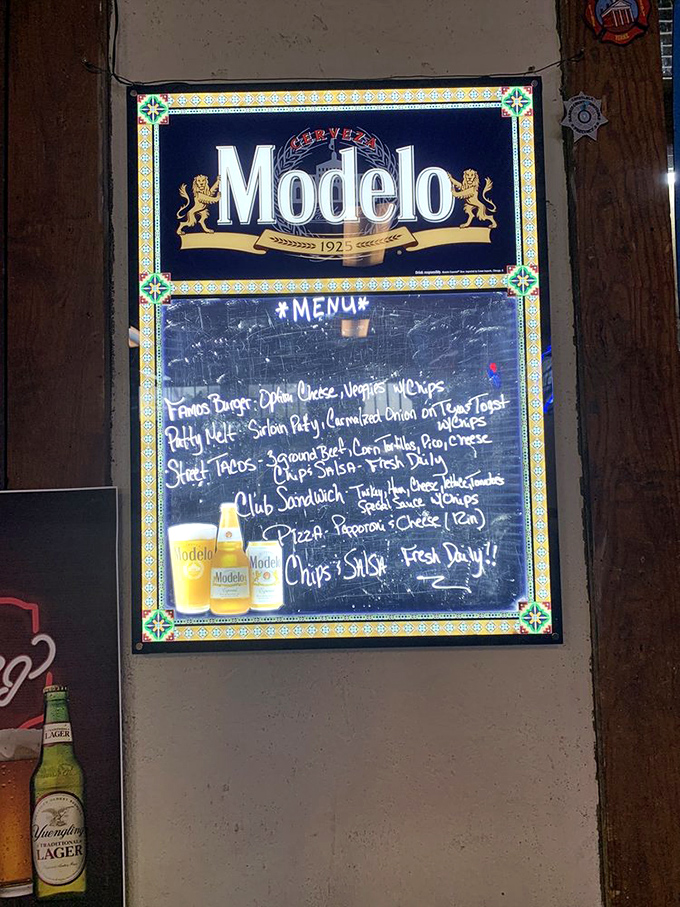 The handwritten menu board&mdash;where culinary dreams are spelled out in chalk and washed down with cold Modelo.