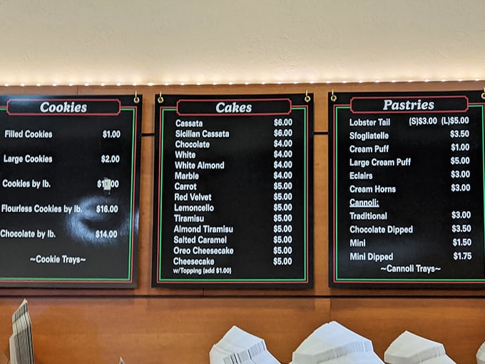 The menu board&mdash;a roadmap to happiness. Cassata cake leads the charge, while an army of Italian classics stands at attention, awaiting your selection.