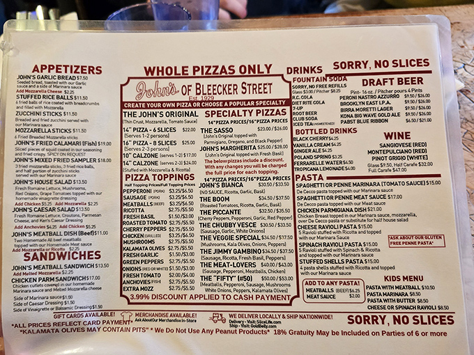 The menu reads like a love letter to Italian-American classics. Notice that "No Slices" warning? They're serious about it.