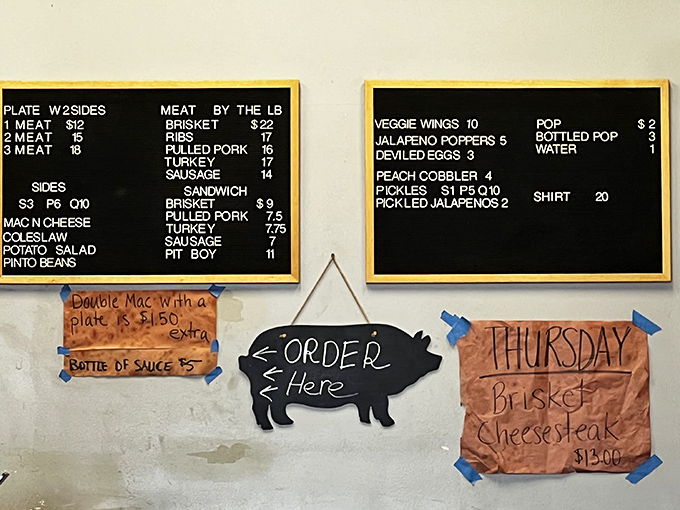 The menu board speaks the universal language of barbecue devotees: meat, sides, and nothing you don't need. Simplicity is the ultimate sophistication.