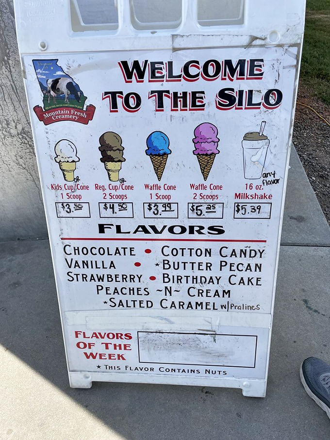 The menu board reveals the true dilemma of adulthood: choosing between waffle cones, milkshakes, and flavors that would make even the most disciplined dieter weak at the knees.