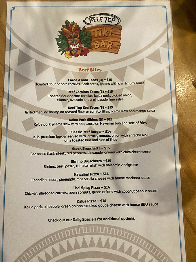 The Reef Top Tiki Bar menu reads like a culinary passport, stamped with Hawaiian, Mexican, and Thai influences. Landlocked? Not your taste buds.