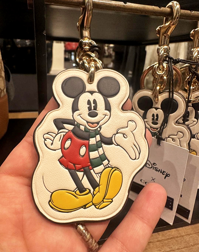 Mickey's winter-ready charm dangles enticingly at the Disney store, where childhood nostalgia meets adult purchasing power.