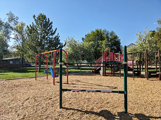 At Midway's playgrounds, kids burn energy while parents burn with envy over those mountain views that make office cubicles seem like cruel jokes.