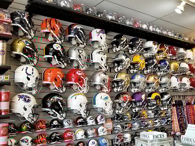 A wall of NFL team helmets creates a colorful mosaic of fandom – the perfect trophy for the sports enthusiast in your life.