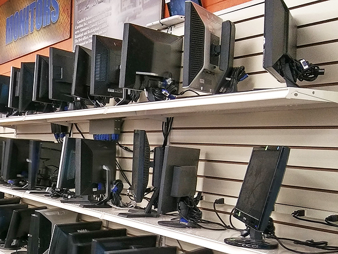 Technology graveyard or budget home office solution? These monitors await their second act in the digital drama of someone's life.