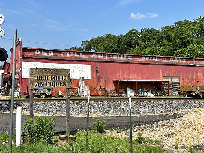 Old Mill Antiques isn't just weathered &ndash; it's earned those rustic red boards through decades of housing treasures that someone's spouse definitely called "just more junk."
