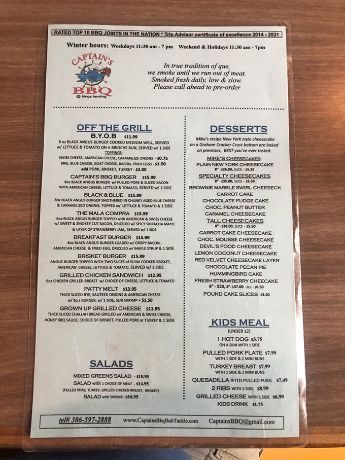 The menu reads like a love letter to smoked meat enthusiasts – notice they smoke "until they run out." Respect.