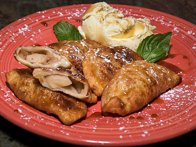 Golden-brown perfection on a fiesta-colored plate. These hand-pinched pockets of joy are what food dreams are made of.