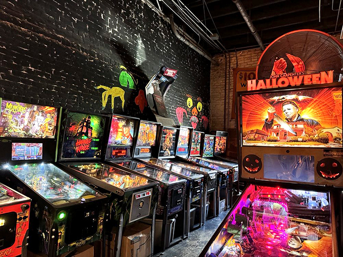 Horror and nostalgia collide in the museum's pinball arcade, where vintage machines light up the darkness with their Halloween-themed glow. Michael Myers approves.