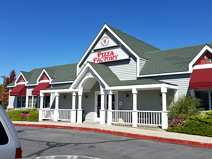 Pizza Factory's welcoming front porch practically begs you to sit a spell before diving into their hand-tossed pies &ndash; small-town dining with big-time flavor.