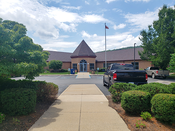The public library stands as Clearfield's community living room, where stories are shared and adventures begin under that distinctive pyramid roof.