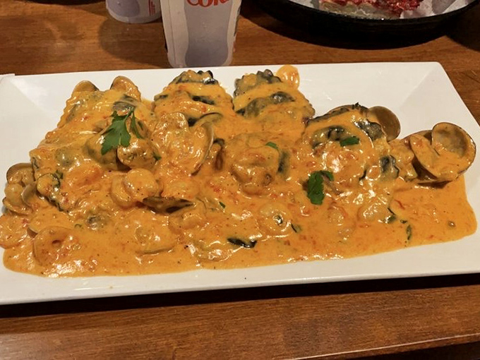 This ravioli swimming in creamy vodka sauce isn't just dinner&mdash;it's therapy in pasta form. Each bite delivers comfort that no therapist could charge enough for.