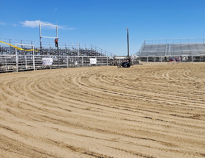 Where cowboys earn their stripes and city slickers earn their respect. The rodeo grounds await their next moment of dusty glory.
