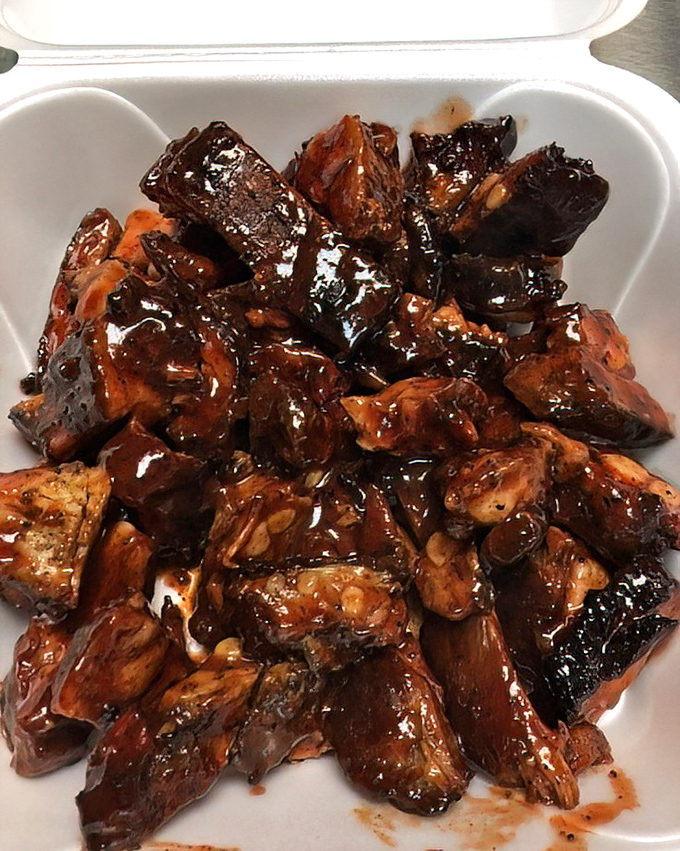 Glistening with sauce and packed with flavor, these rib tips aren't just food&mdash;they're edible evidence that patience and smoke create magic.