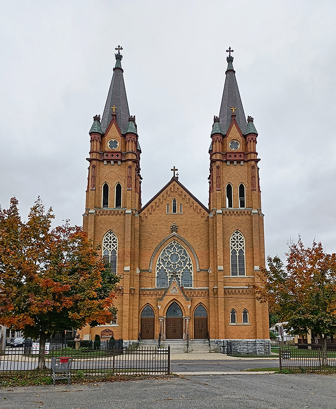 St. Stanislaus Kostka Church's twin spires reach skyward like exclamation points, a breathtaking testament to the town's Polish heritage and architectural ambition.