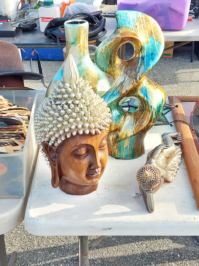 Eastern meets Western in this artisan display. That wooden Buddha looks serene enough to bring zen to even the most cluttered living room.