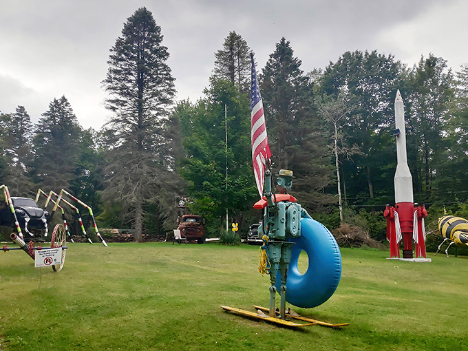 American pride meets artistic vision in this outdoor gallery where metal creatures and patriotic displays coexist in surprising harmony.