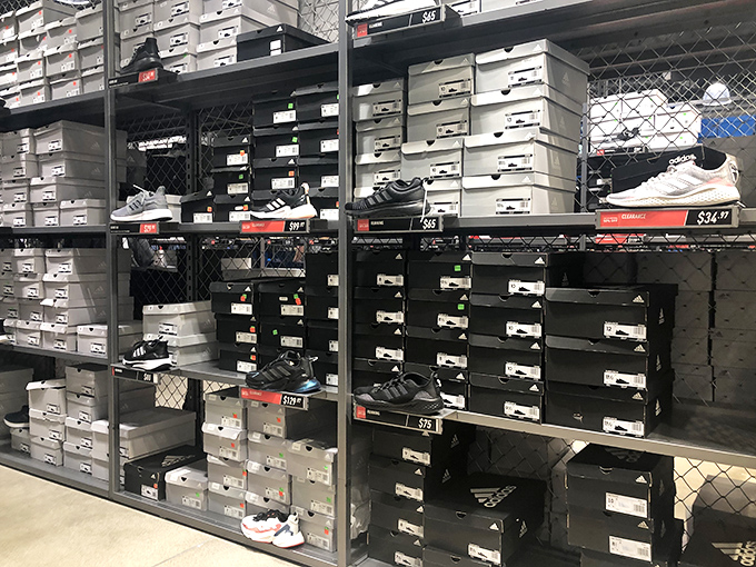 Sneaker heaven exists, and it's organized in perfect rows. Your feet are already thanking you for the cushioned future they're about to experience.