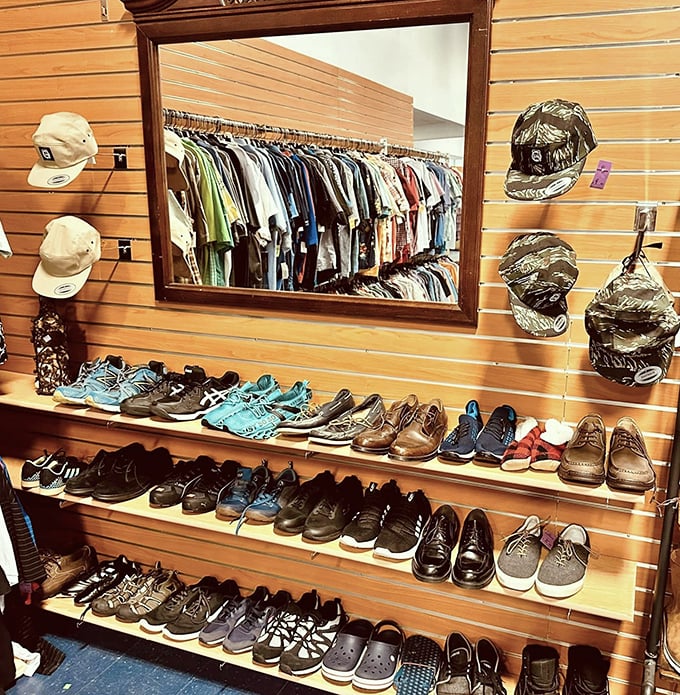 Shoes lined up like soldiers ready for their next mission, with caps standing guard above.