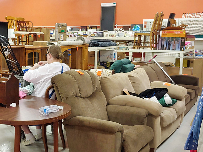 That beige recliner has definitely seen some Sunday football games and knows all the best nap positions.
