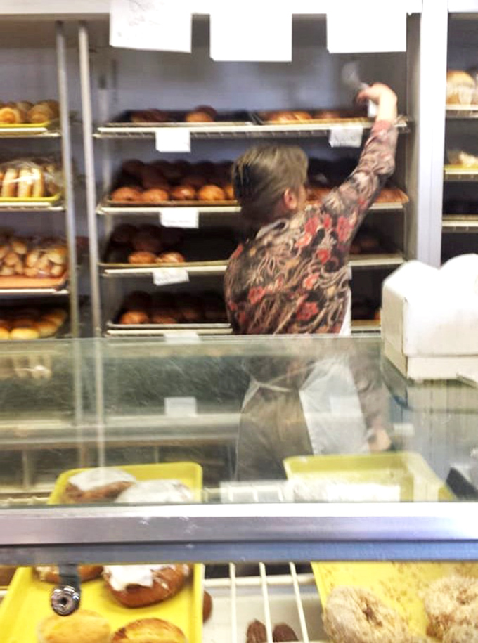 Behind the scenes, skilled hands arrange fresh-baked goods with the precision of a Swiss watchmaker and the love of a grandmother.