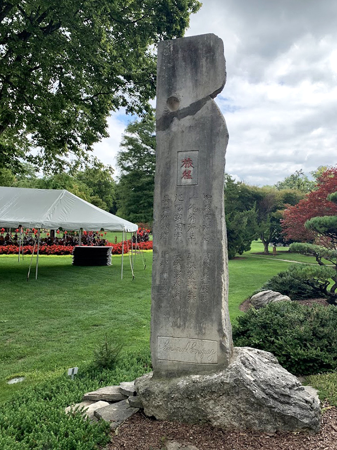 Ancient wisdom meets Midwest charm. This stone monument stands like a philosophical sentinel, reminding visitors that great gardens speak a universal language.