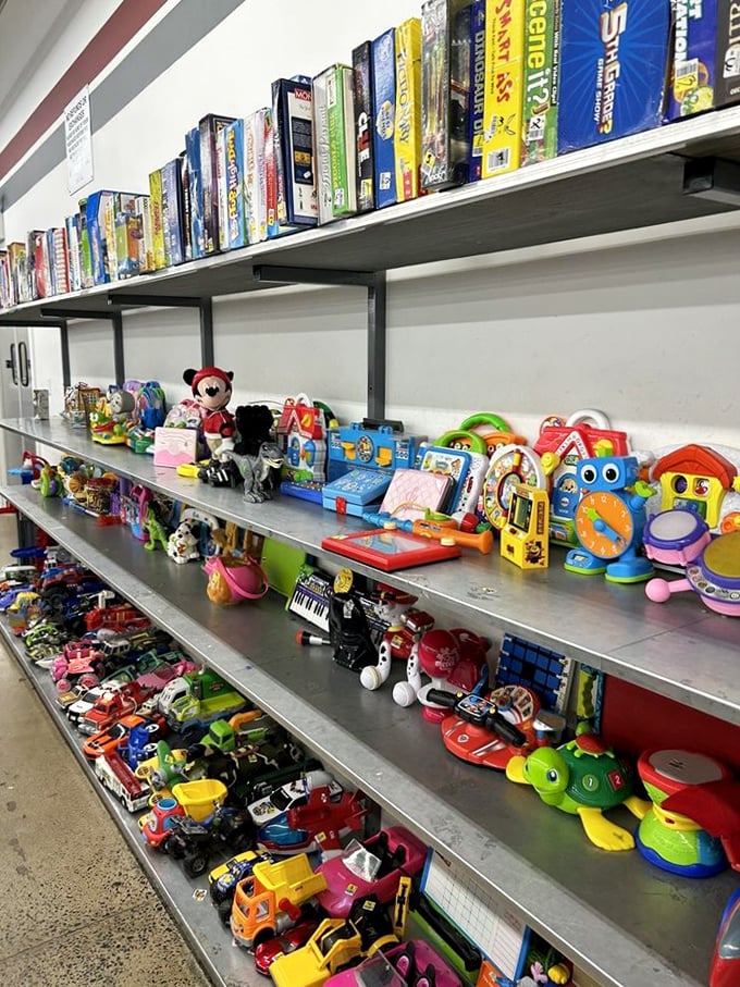 Childhood nostalgia by the shelf-full! Mickey Mouse mingles with modern toys, creating a playground where memories and imagination collide.