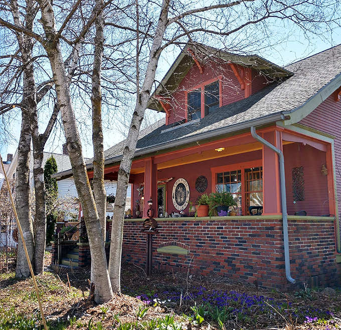 This coral-colored cottage houses Two Fish Gallery, where local art captures the spirit of the lake in ways your smartphone camera never could.