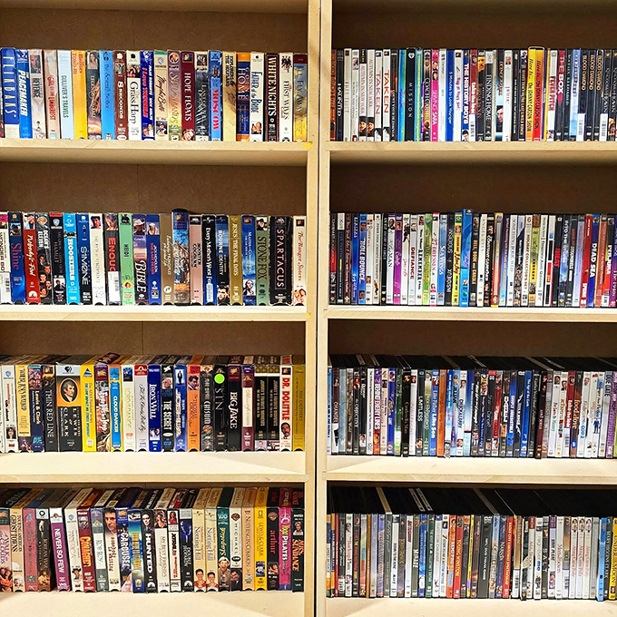 Shelves of DVDs and VHS tapes create a time capsule where your favorite movies cost less than popcorn.