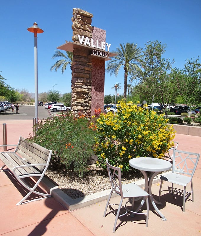 Valley Court's stone pillars and desert landscaping prove that outlet shopping in Arizona doesn't have to sacrifice style for savings.
