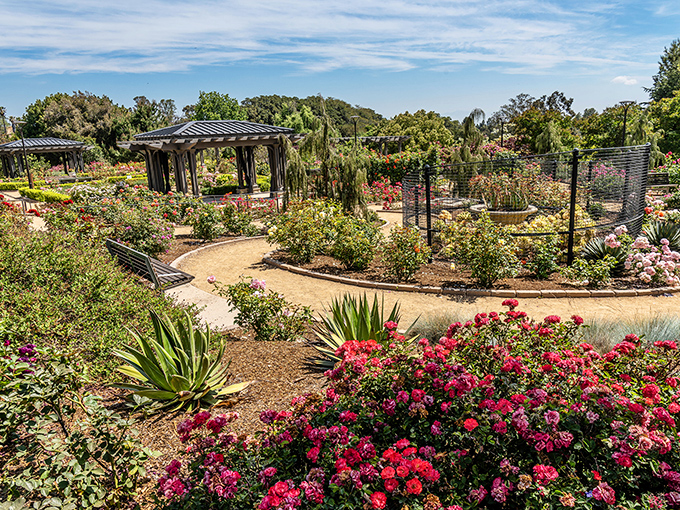 A painter's palette come to life&mdash;vibrant roses and winding paths invite you to lose yourself in nature's artistry.