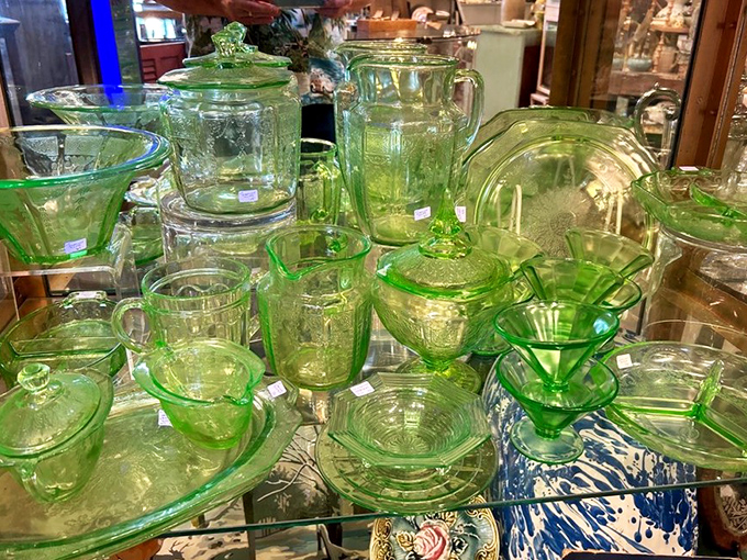 Depression-era green glass catches light like emeralds, each piece whispering tales of elegant dinners.