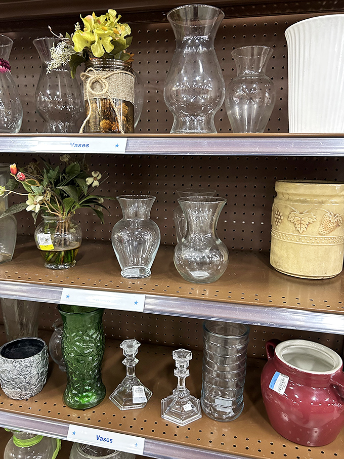 Crystal vases stand at attention like transparent soldiers, waiting to be drafted into service for your next dinner party or spontaneous flower purchase.