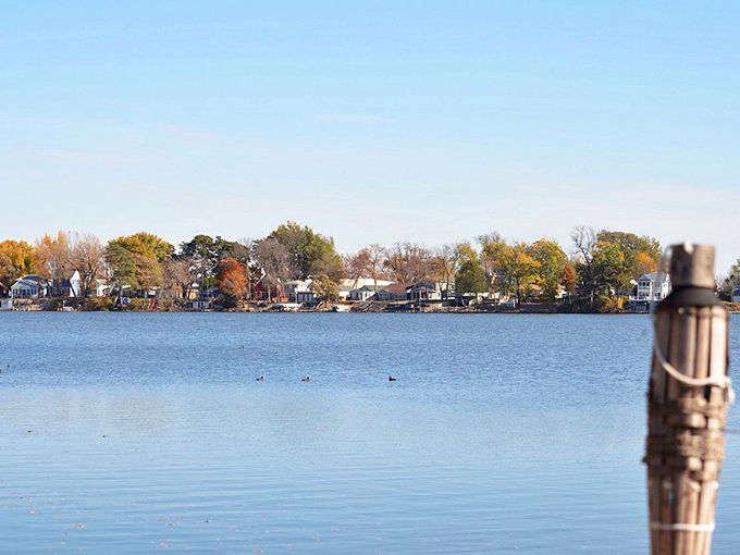 Autumn paints Lake View's shoreline with a palette that would make Bob Ross weep with joy. Those little houses aren't just homes&mdash;they're front-row seats to nature's greatest show.