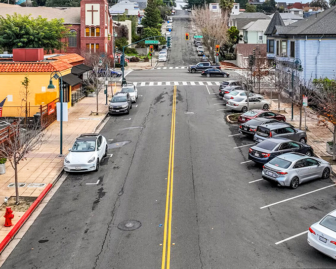 Virginia Street captures Vallejo's small-town feel with its colorful buildings and walkable neighborhoods. The church steeple watches over daily life below.
