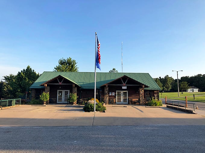 The rustic log cabin visitor center welcomes adventurers with its charming frontier aesthetic &ndash; like walking into Oklahoma's version of a wilderness embassy.