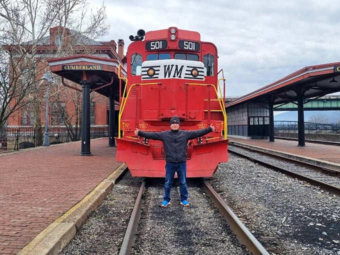 That bright red locomotive isn't compensating for anything; it's just confidently announcing that adventure has arrived at the station.