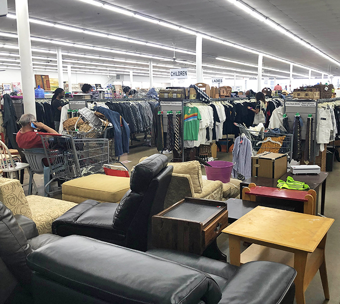 The furniture section resembles a living room time capsule, where mid-century meets millennium in a comfortable chaos of possibility.