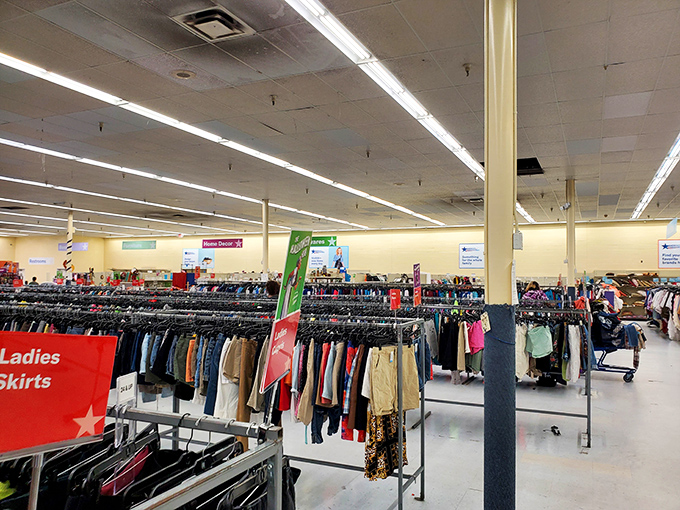 Endless racks stretch toward the fluorescent horizon, a textile galaxy where each hanger holds a story waiting to be continued.