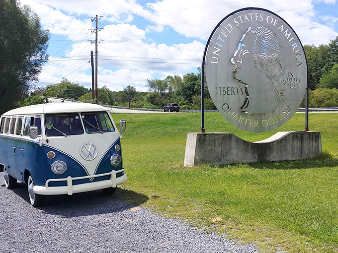 Classic meets colossal &ndash; a vintage VW bus pays homage to America's oversized roadside charm. Road trip perfection captured in one frame.