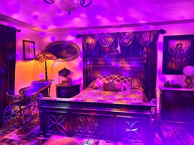 This bedroom could make Vegas jealous with its purple mood lighting and vintage elegance&mdash;like sleeping inside a royal amethyst.