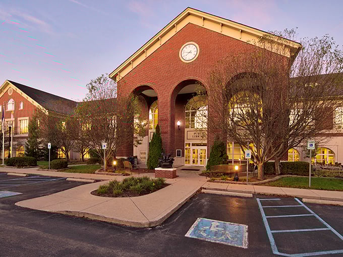 The library's arched entrance whispers "come in and stay awhile" to every passerby.