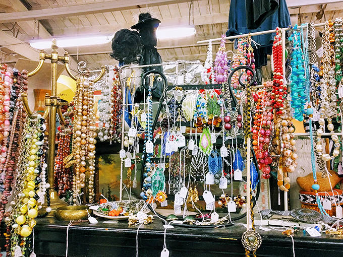A jewelry display that would make Elizabeth Taylor pause mid-sentence. Each necklace tells a story from another era, waiting for its next chapter.